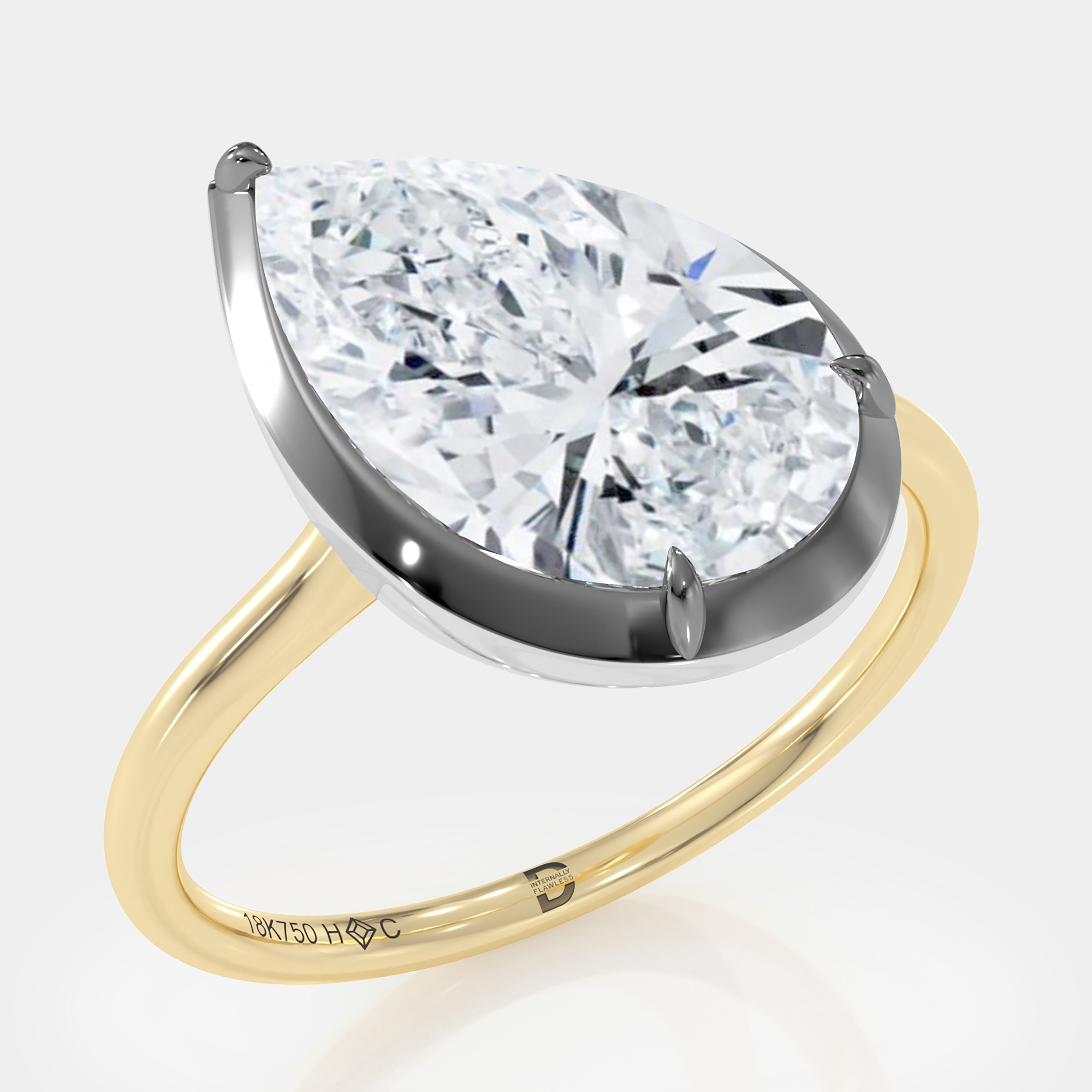 Two-Tone Tilted Pear Diamond Ring | Shop Now